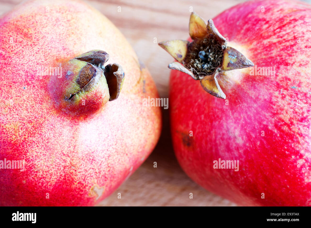 Two ripe pomegranate fruit close-up Stock Photo - Alamy