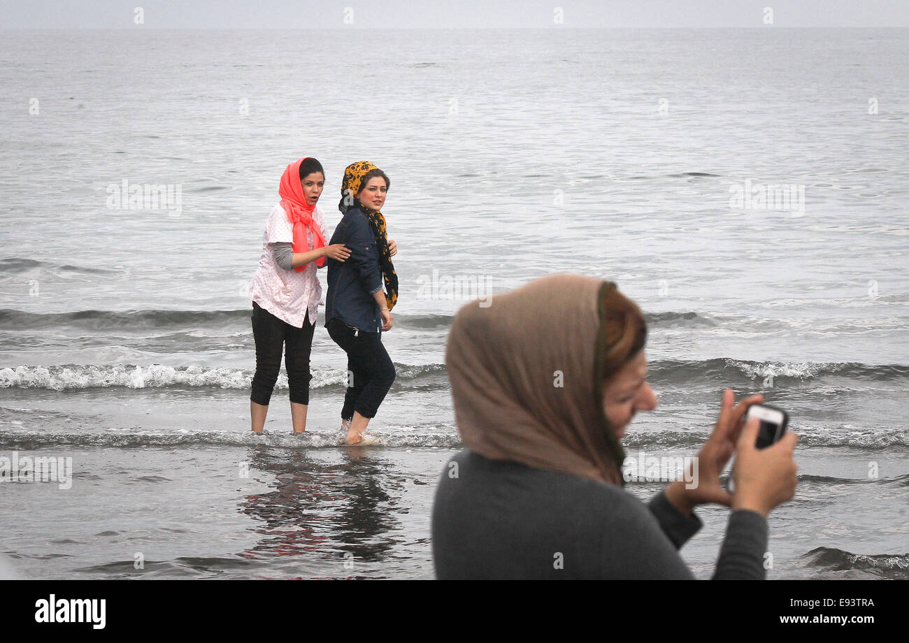 Chaloos, Iran. 17th Oct, 2014. Iranian women enjoy themselves at the ...