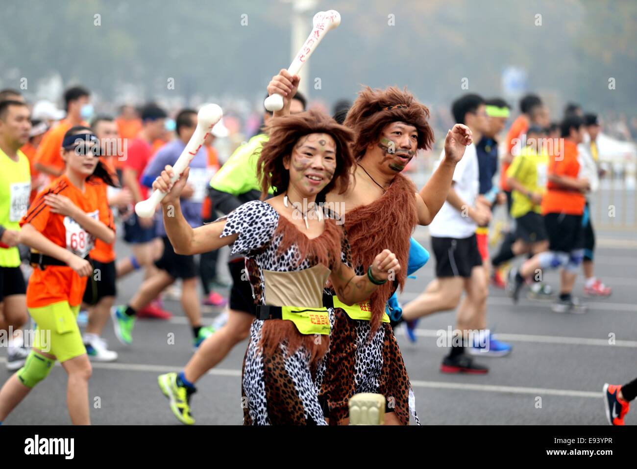 Beijing, China. 19th Oct, 2014. Two participants dressed as the figures ...
