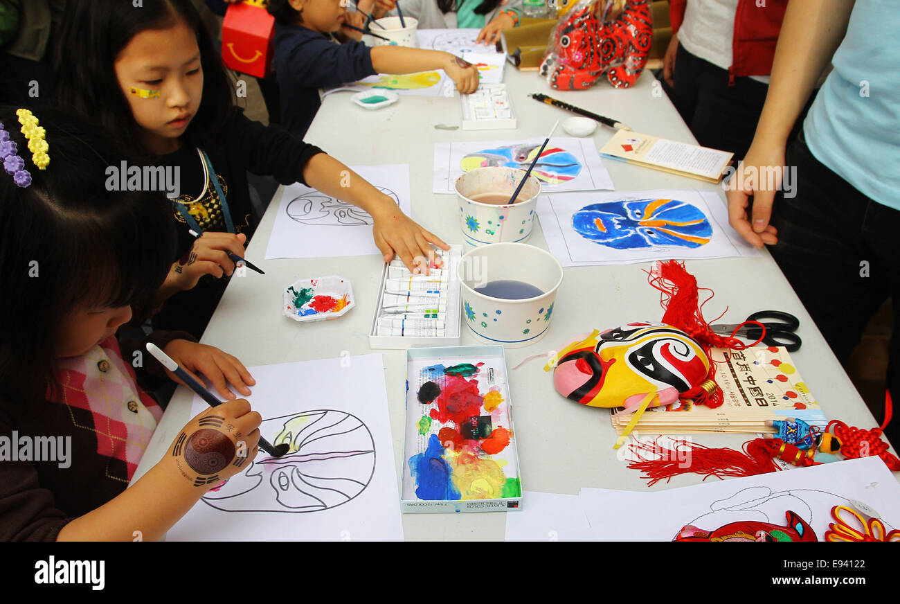 Seoul, South Korea. 19th Oct, 2014. Children paint color onto the ...