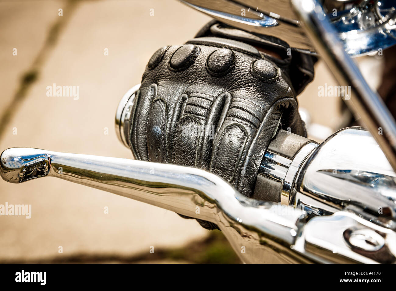 Human hand in a Motorcycle Racing Gloves holds a motorcycle throttle ...