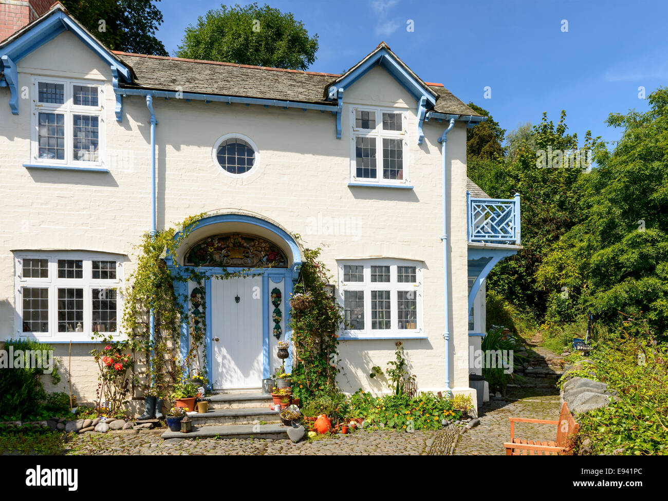 white and light blue cottage in historic fishing village on Devon ...