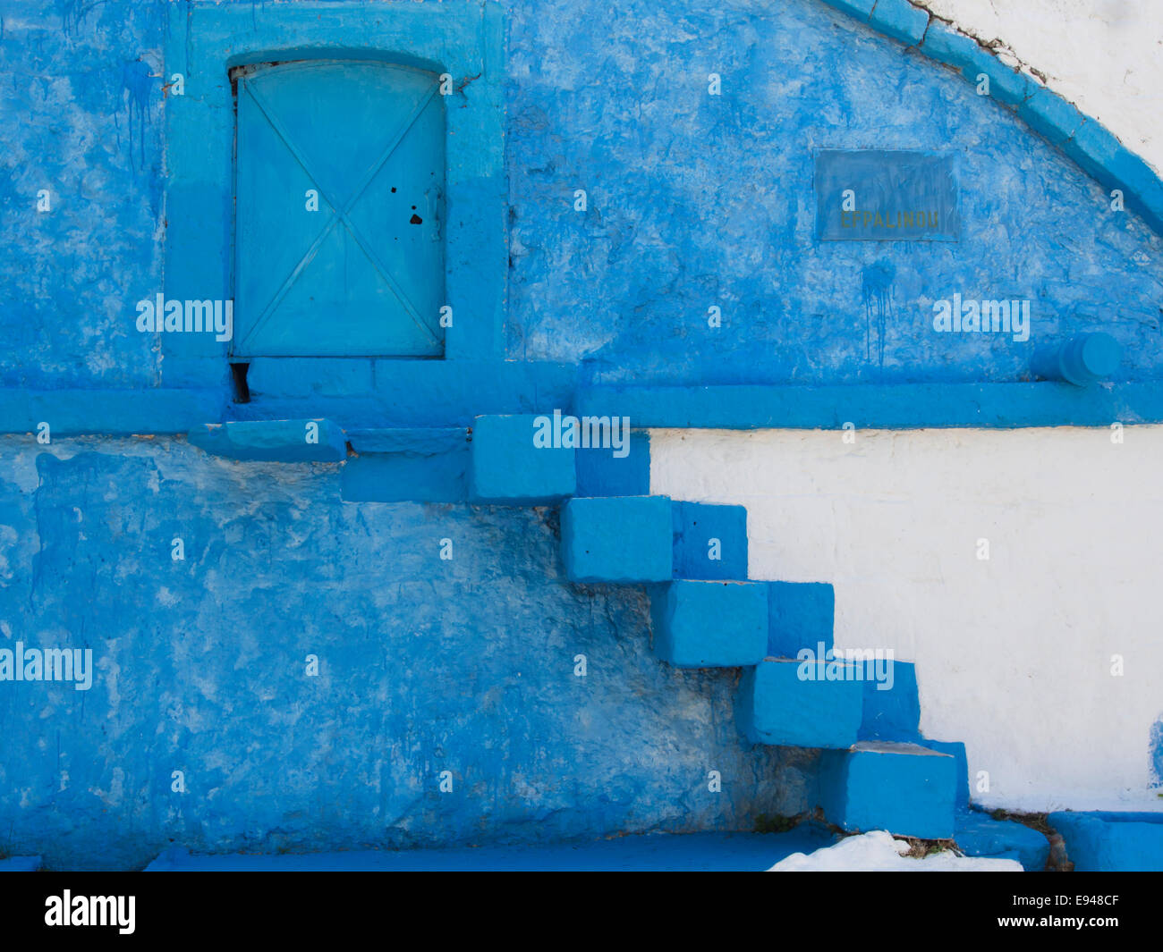 Blue and white painted concrete structure, the symbol of Greece, strong ...