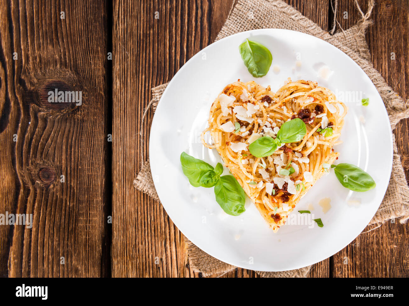 Heart Shape Spaghetti with fresh homemade Tomato Pesto Stock Photo - Alamy