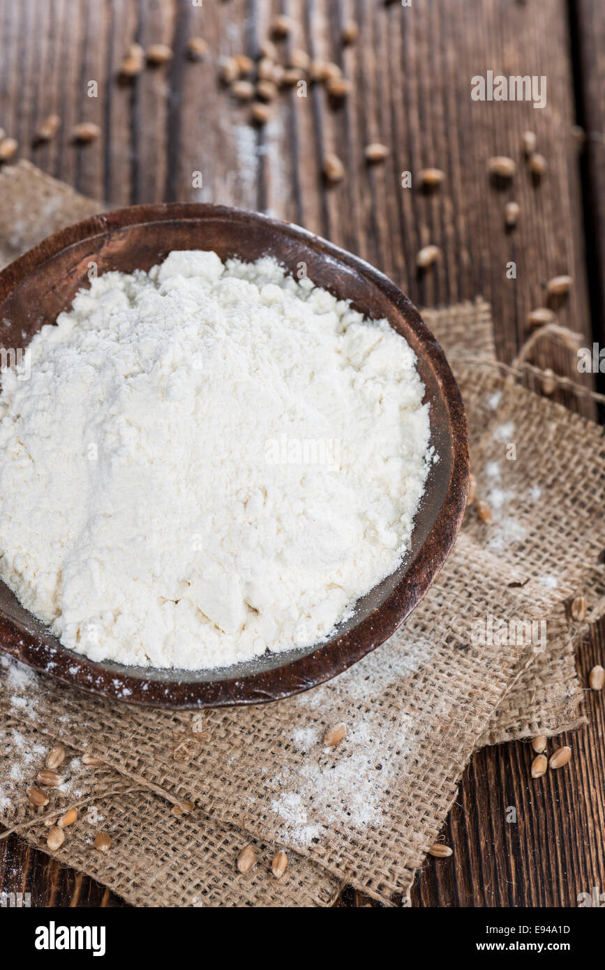 Small portion of Wheat Flour on vintage background Stock Photo - Alamy