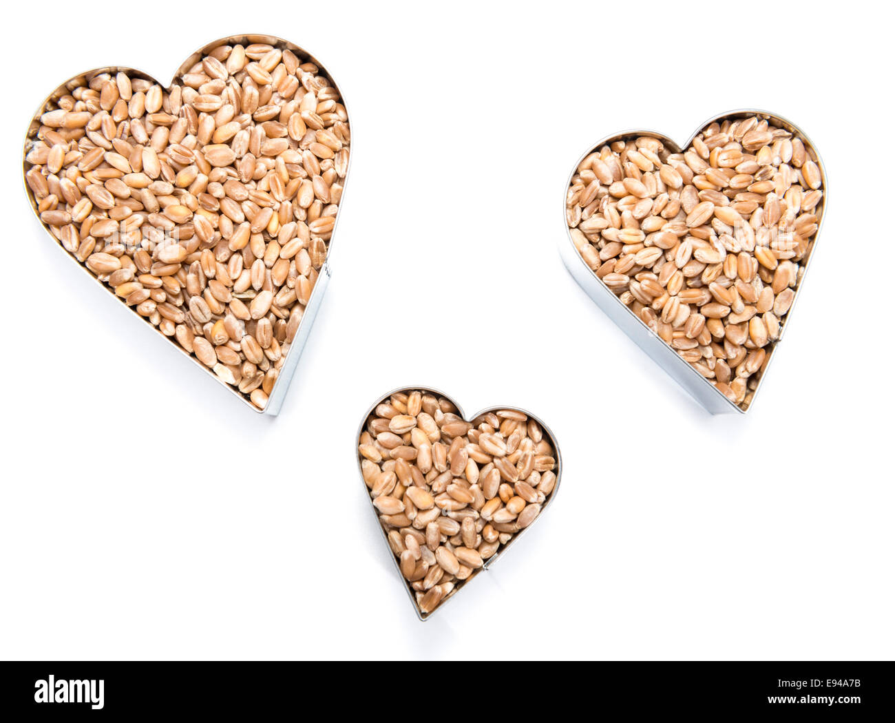 Wheat Grains in heart shapes isolated on pure white background Stock ...