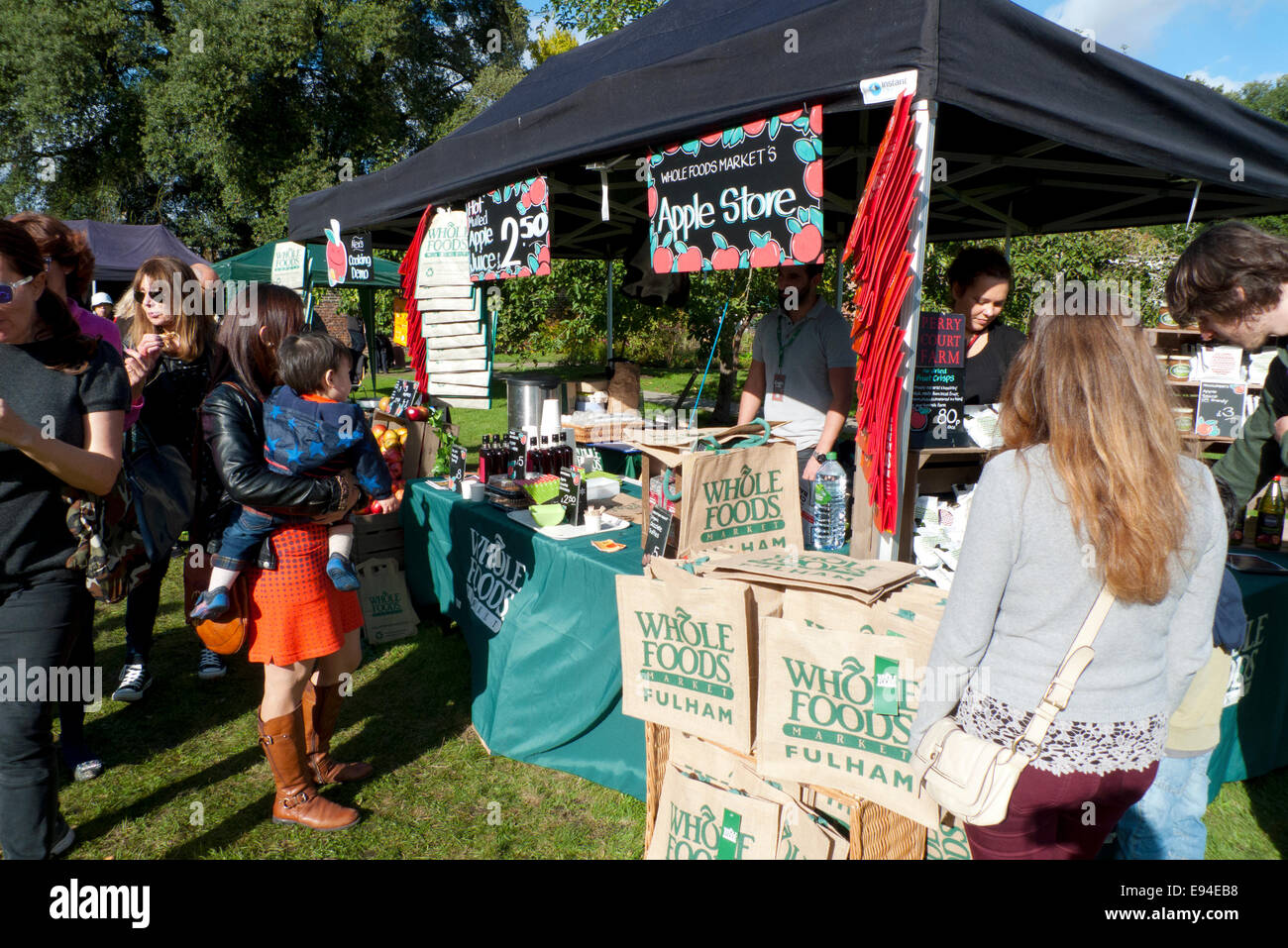 19th Oct, 2014 People shopping at the Apple Store market stall selling ...