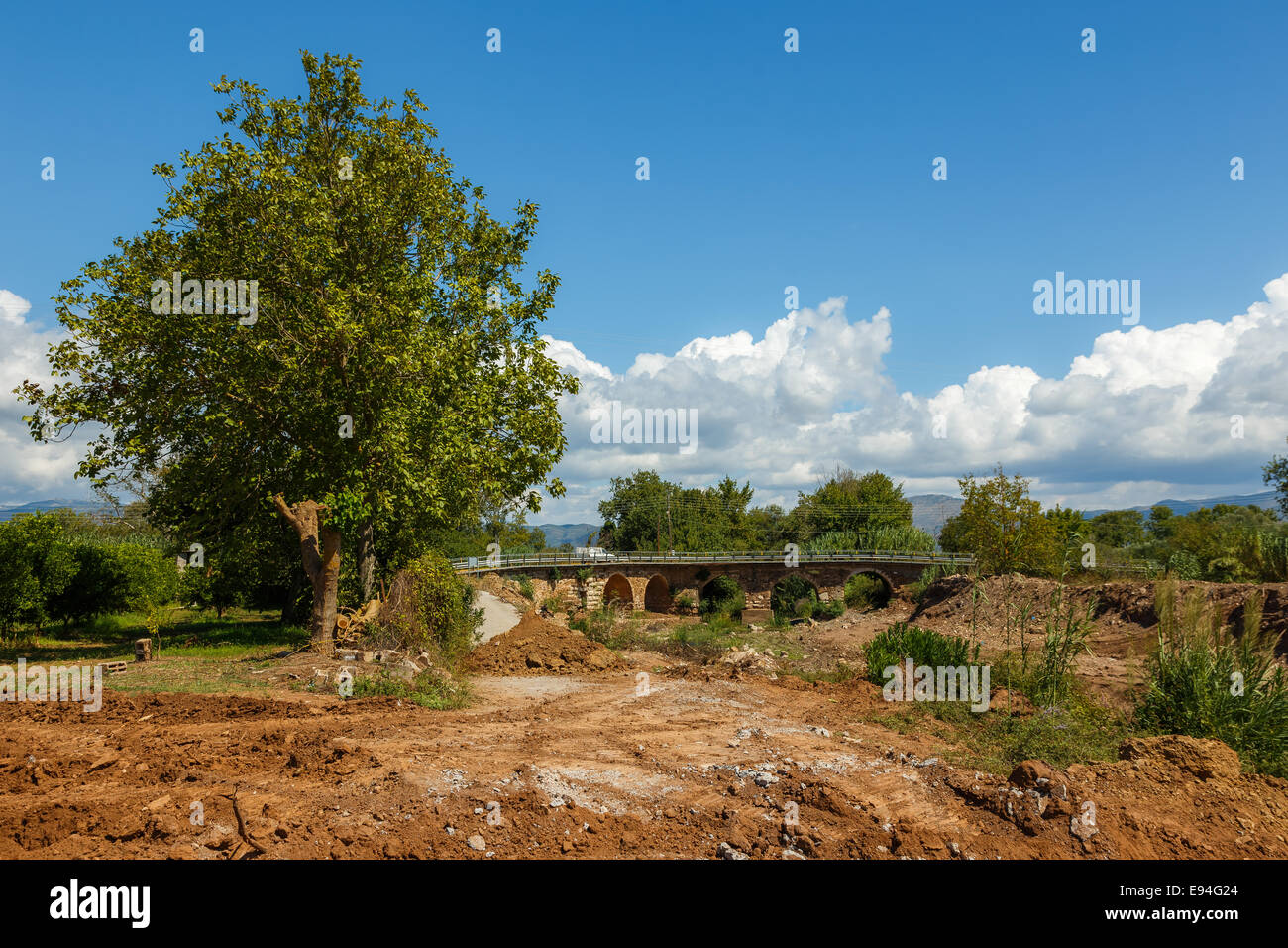 Construction site against a blue sky in Greece with dirt and excavated ...