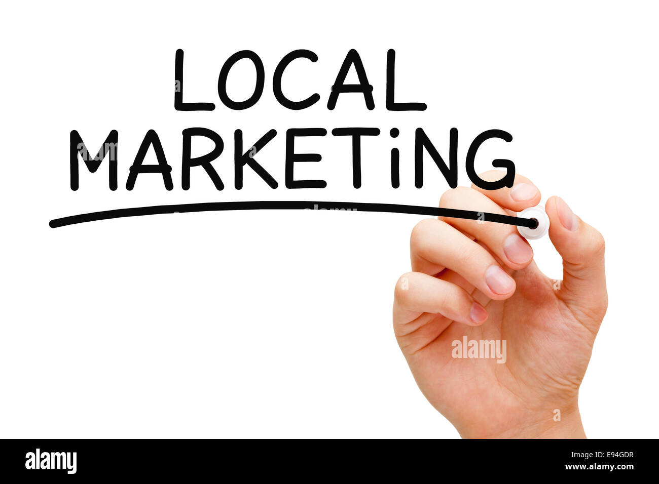 Hand writing Local Marketing with black marker on transparent wipe ...