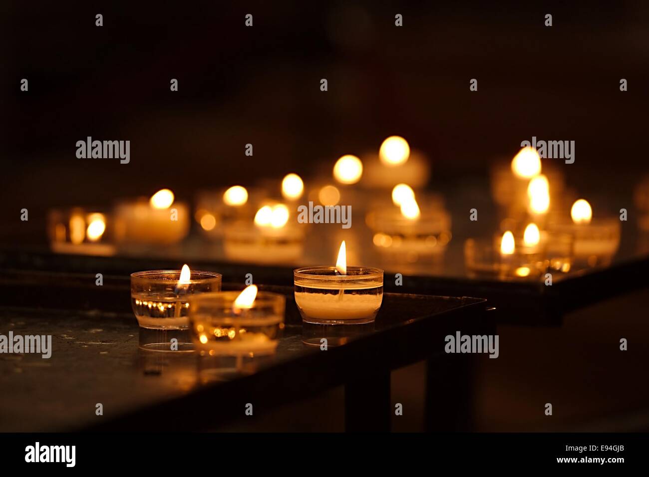 Yellow candle and flame hi-res stock photography and images - Alamy