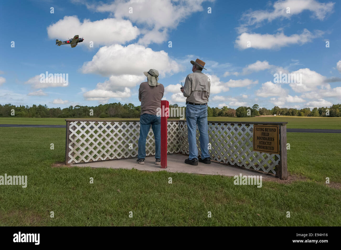 Men flying radio controlled airplanes at the Ocala, Florida model ...