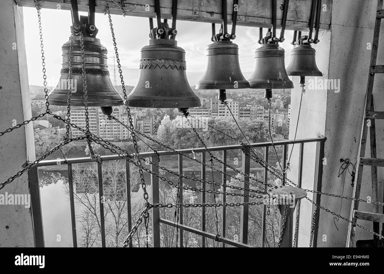 Bells under evening downtown Stock Photo - Alamy
