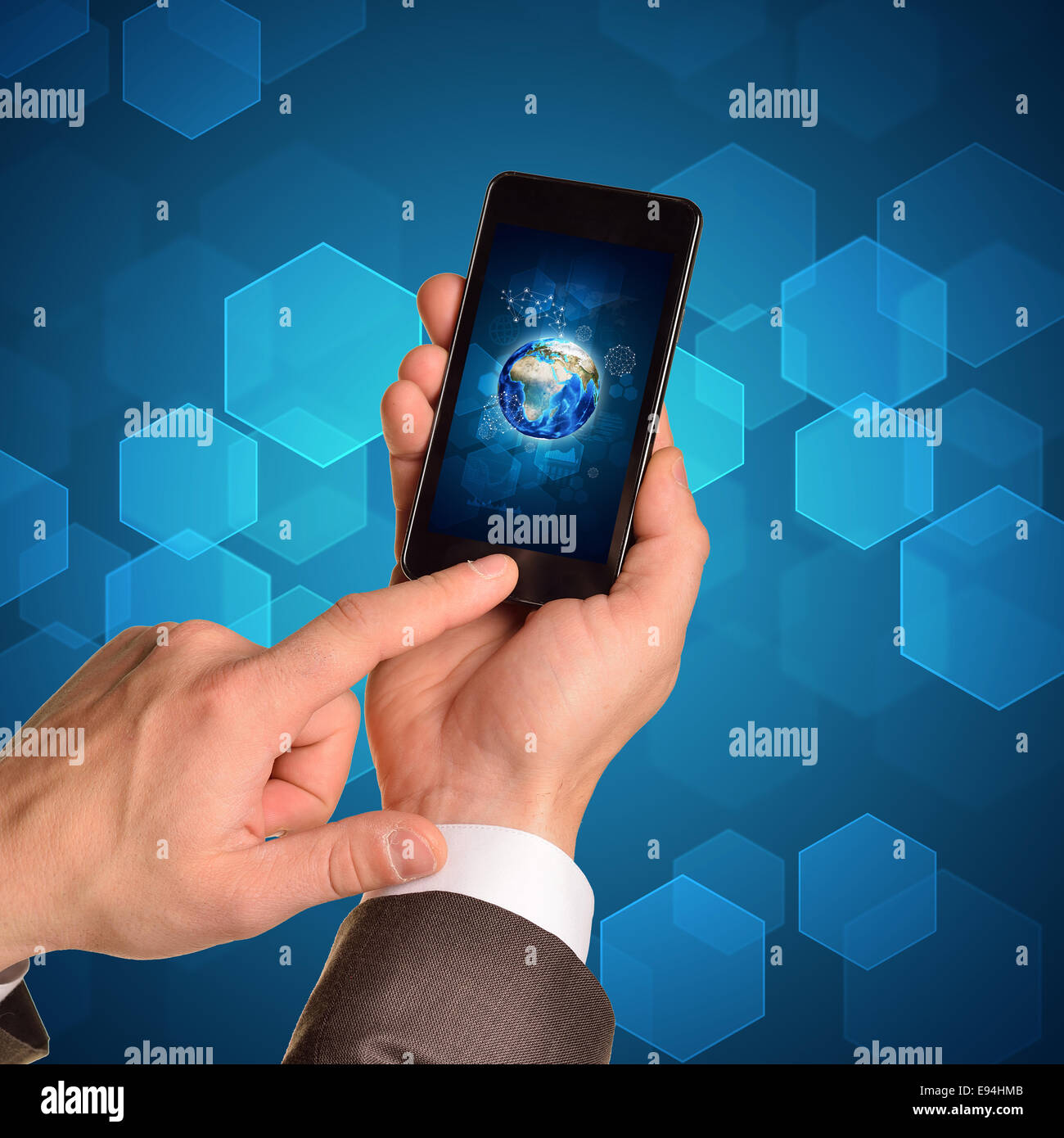 Man hands using smart phone. Image of Earth on screen Stock Photo - Alamy