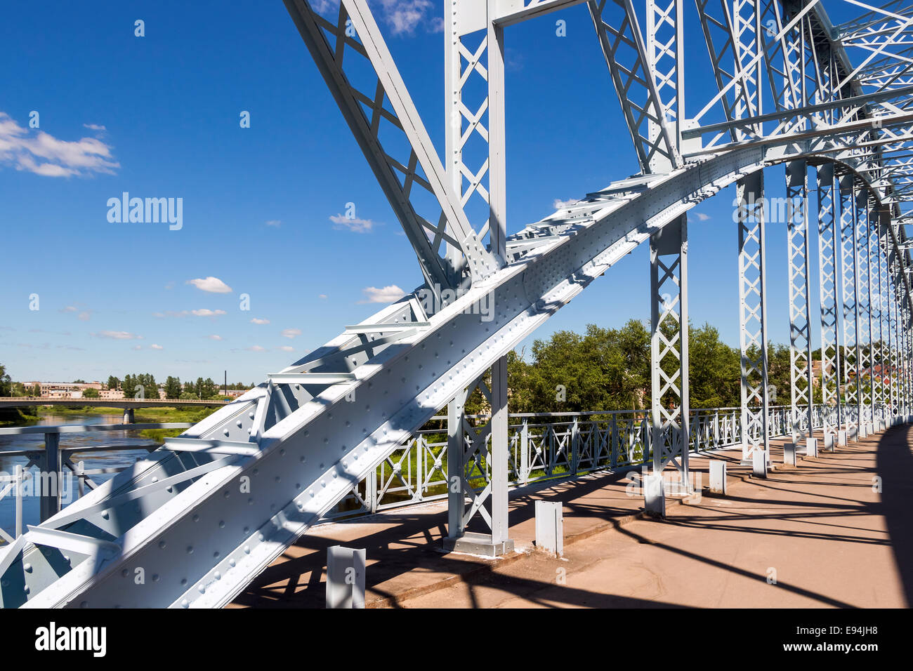 Detail of steel arch bridge across river Msta. Novgorod region, Russia ...