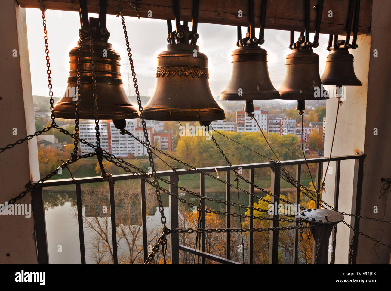 Bells under evening downtown Stock Photo - Alamy