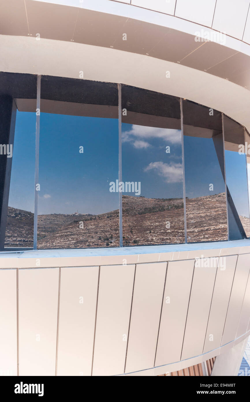 Israel. The Judean mountains reflection on the windows of the ...