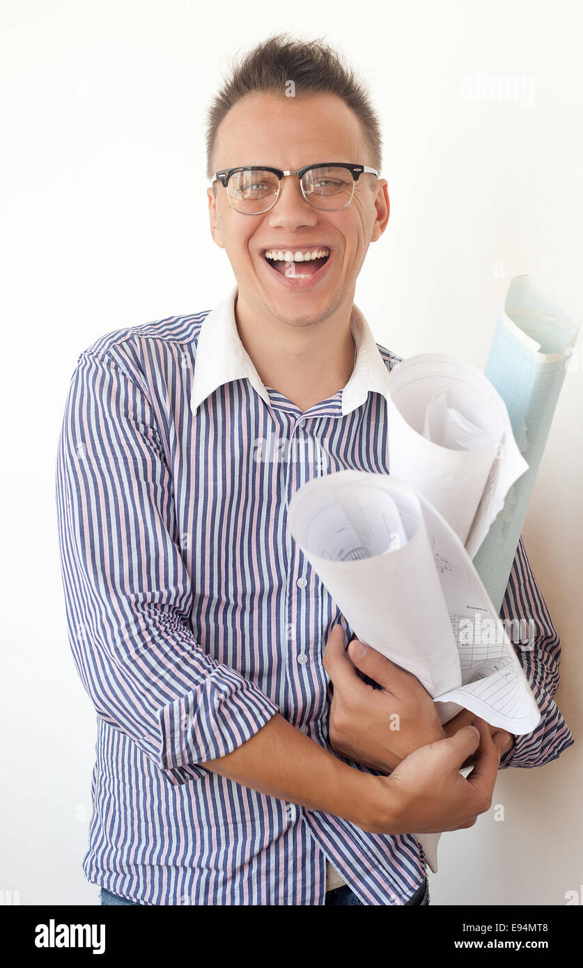 Portrait of expert with blueprints Stock Photo - Alamy