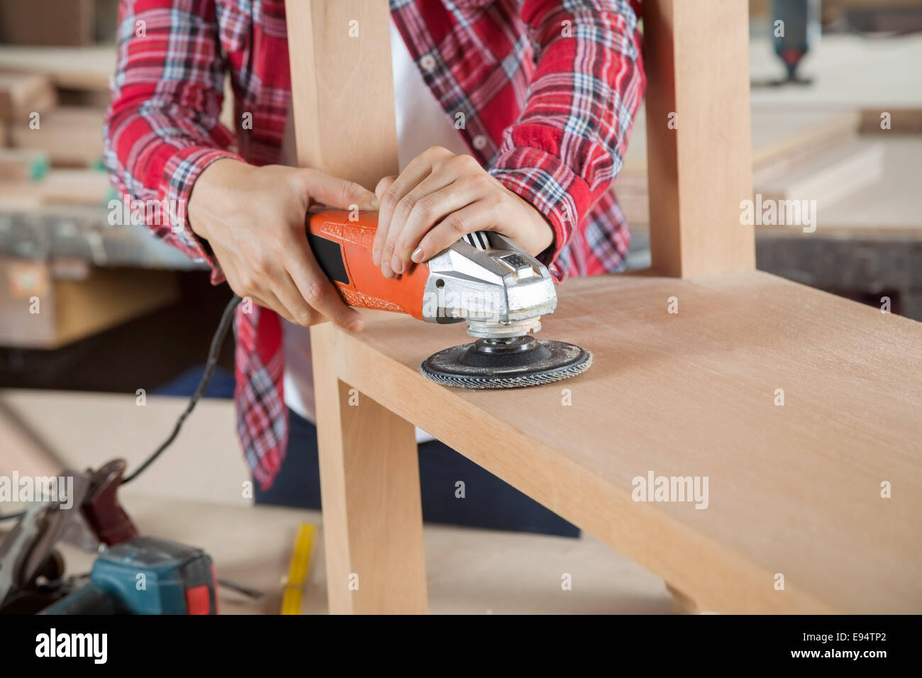 Female electric sander hi-res stock photography and images - Alamy