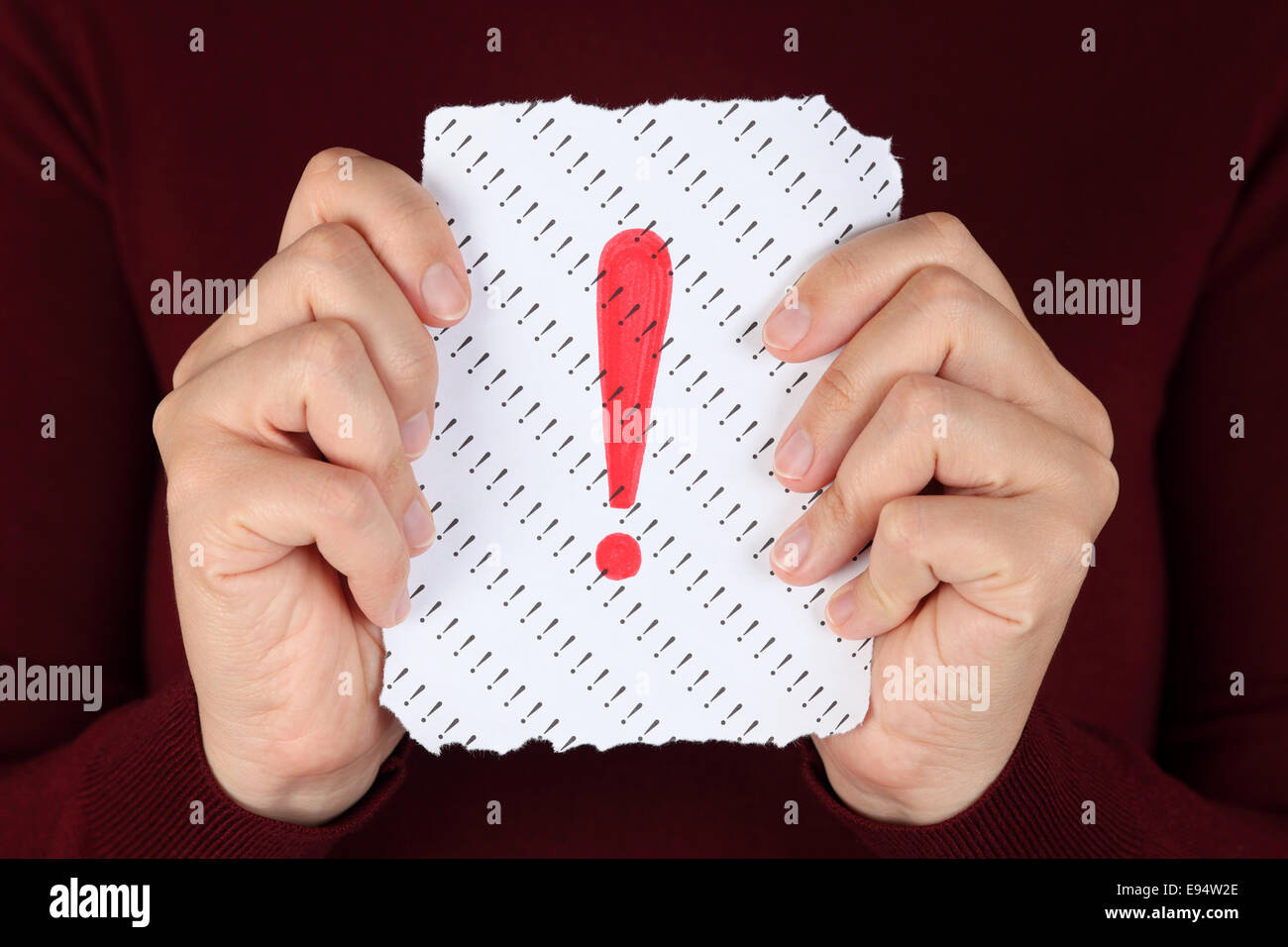 Piece of paper with red Exclamation mark in the woman's hands Stock ...