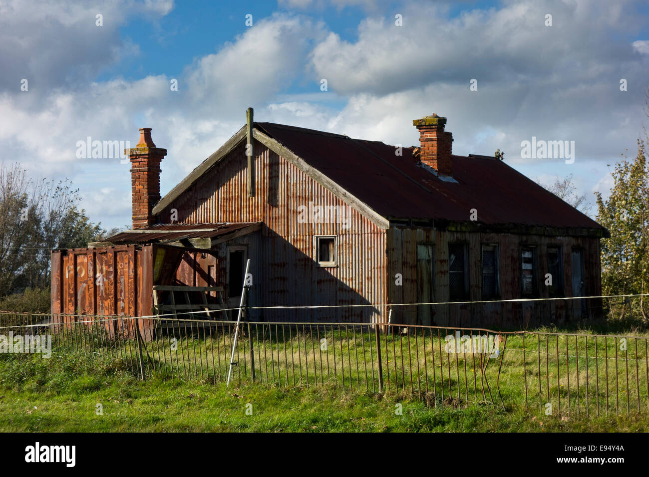Corrugated iron tin farm shack Stock Photo - Alamy