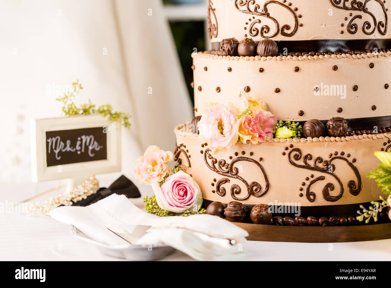 Gourmet tiered wedding cake at wedding reception Stock Photo - Alamy