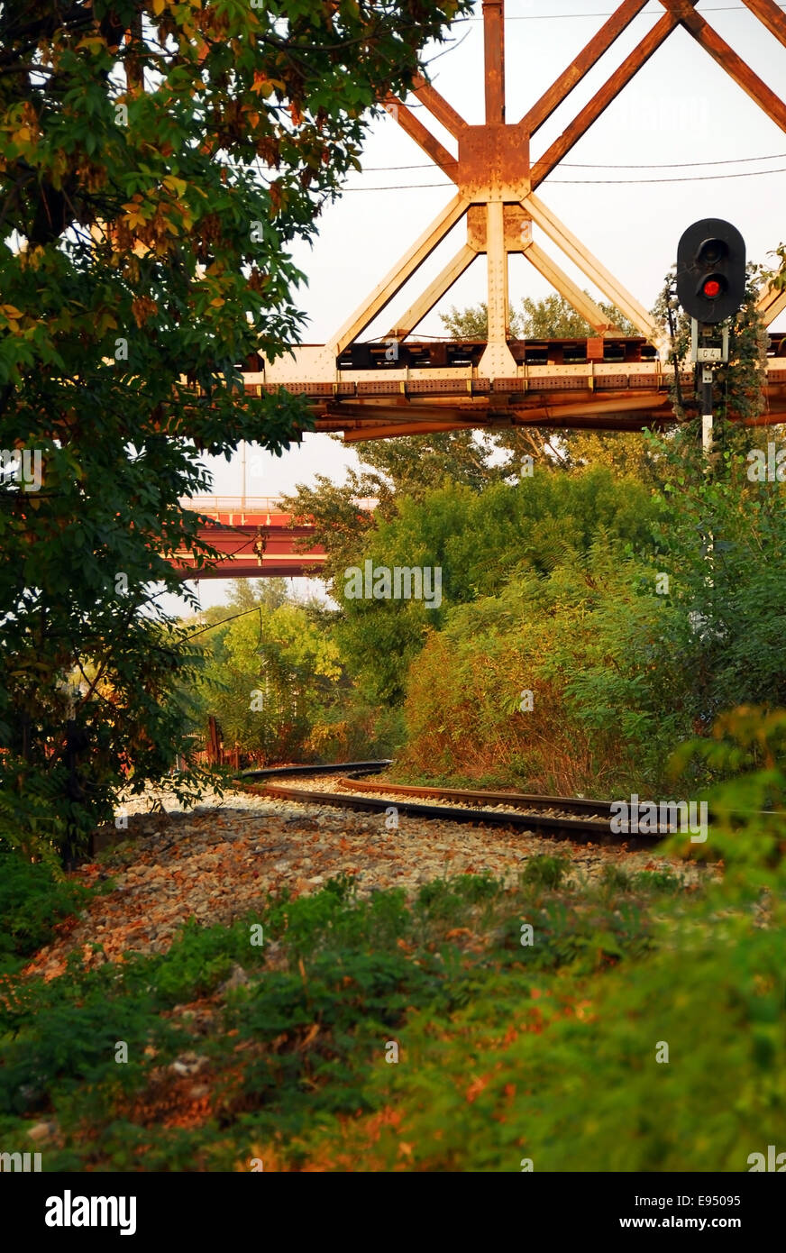 Railroad under railway bridge Stock Photo - Alamy
