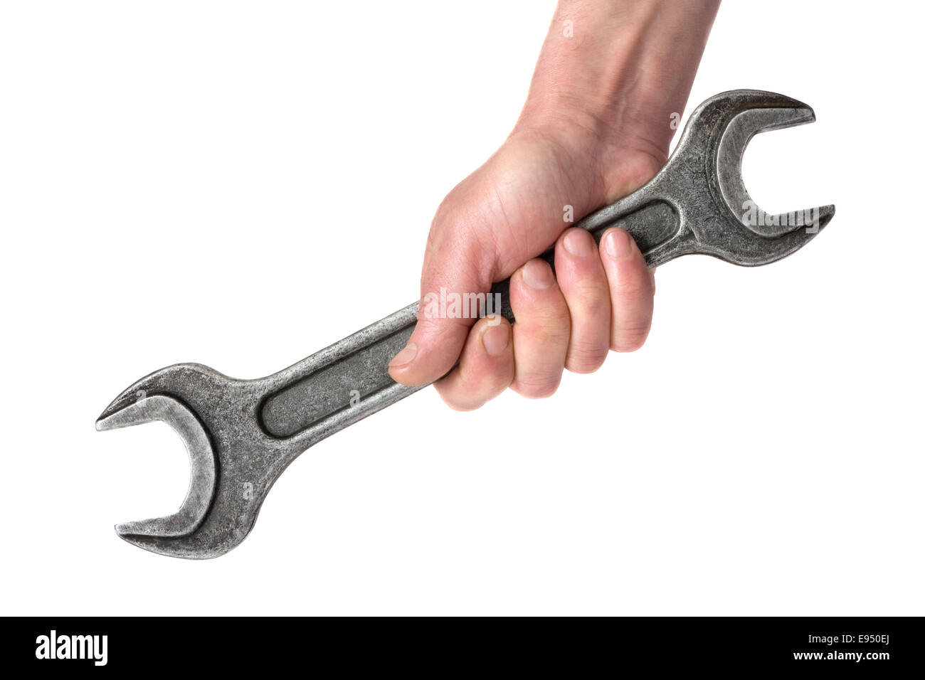 Spanner in a hand Stock Photo - Alamy