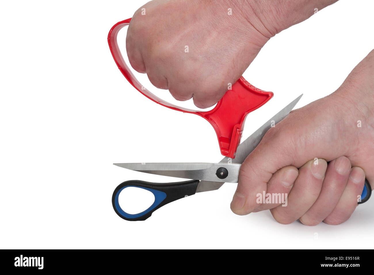 Sharpening of scissors Stock Photo - Alamy