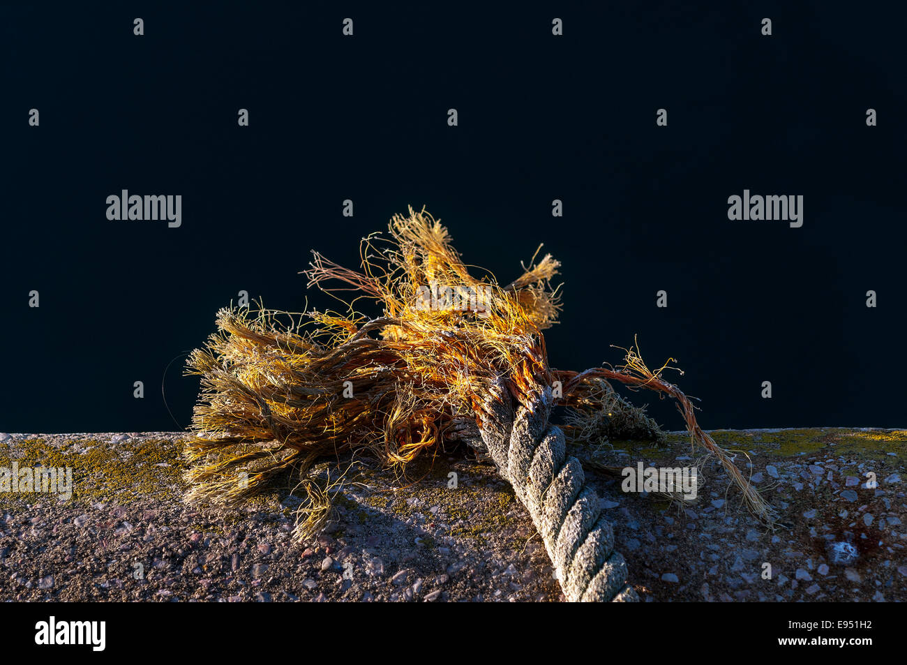 frayed rope on waterfront,rope, fray, frayed, apart, fall, breaking ...