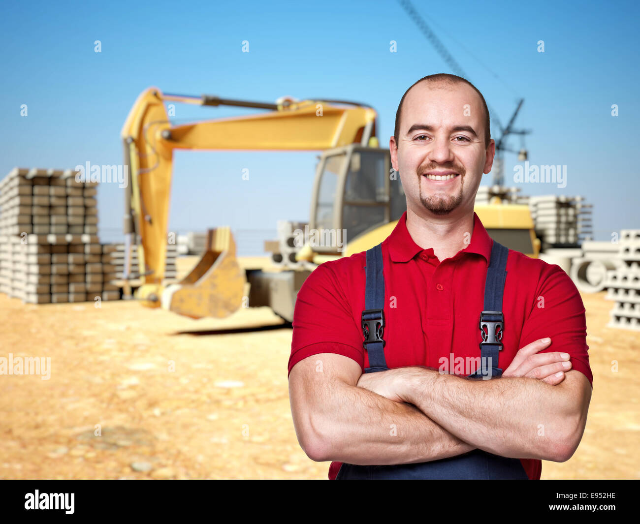 portrait of handyman at construction site Stock Photo - Alamy
