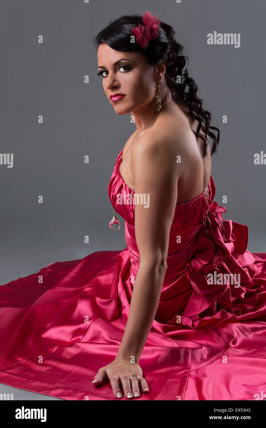 Female in dress pink hi-res stock photography and images - Alamy