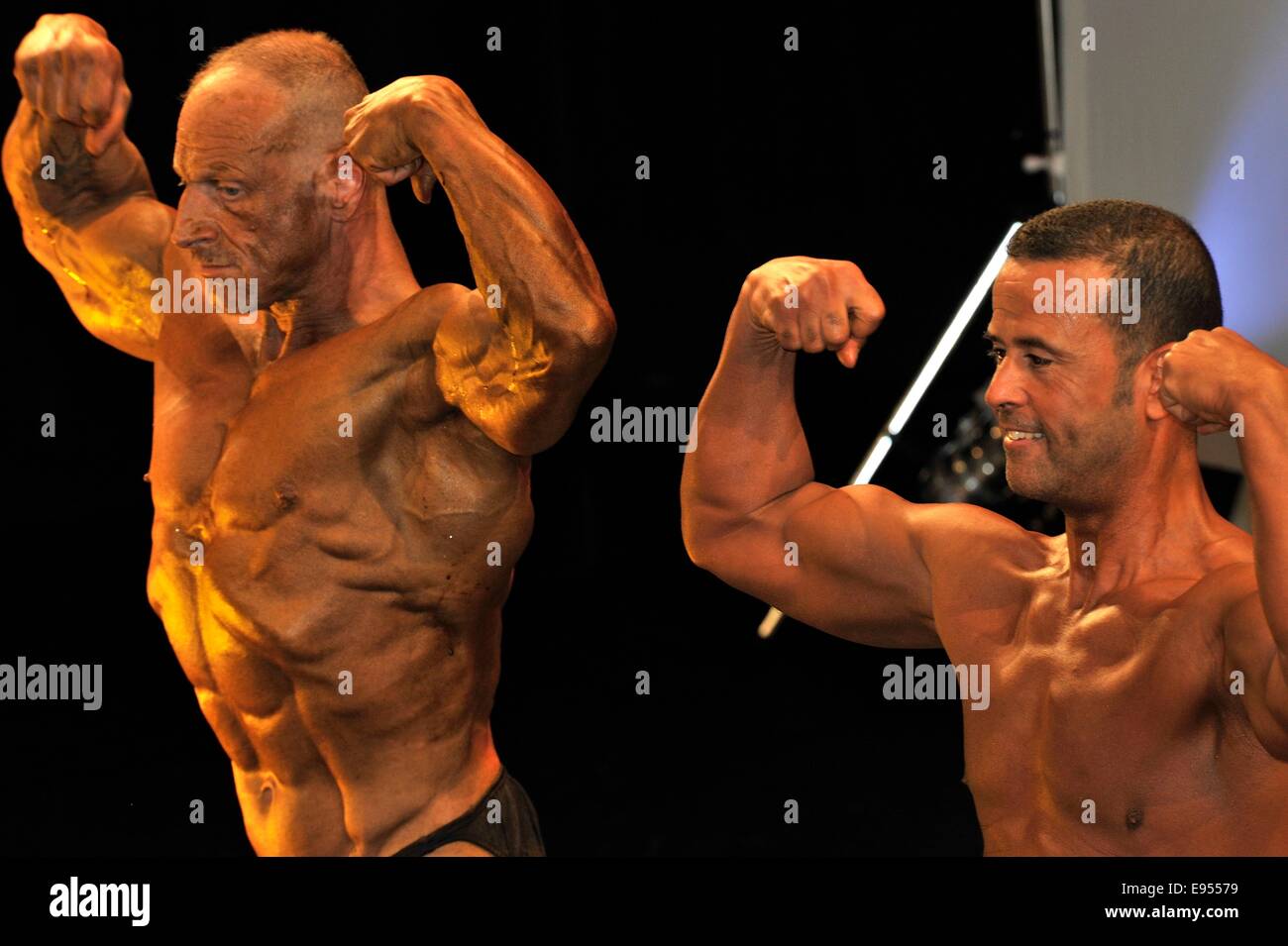 Roosendahl, The Netherlands. 19th Oct, 2014. Male bodybuilders showing ...