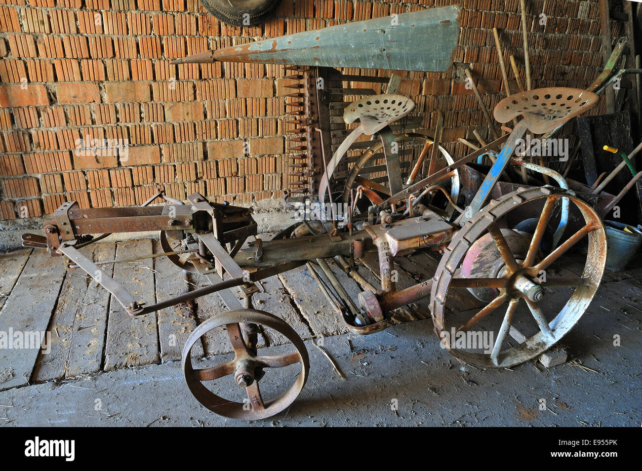 Reaping machine from 1900, in a barn, Middle Franconia, Bavaria ...