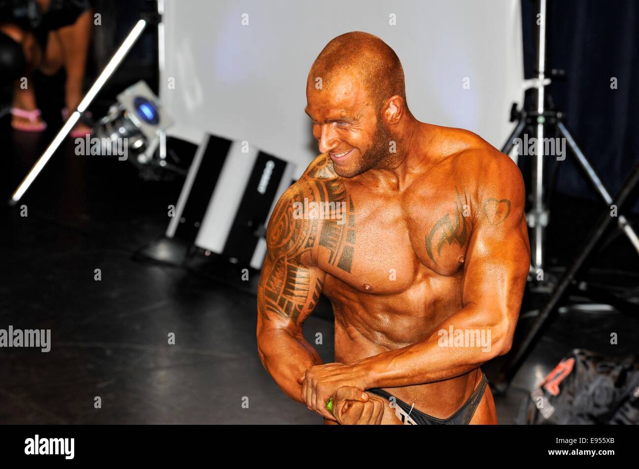 Roosendahl, The Netherlands. 19th Oct, 2014. Male bodybuilders showing ...