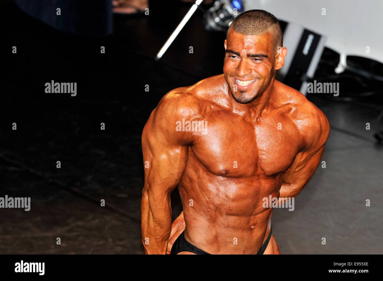 Roosendahl, The Netherlands. 19th Oct, 2014. Male bodybuilders showing ...