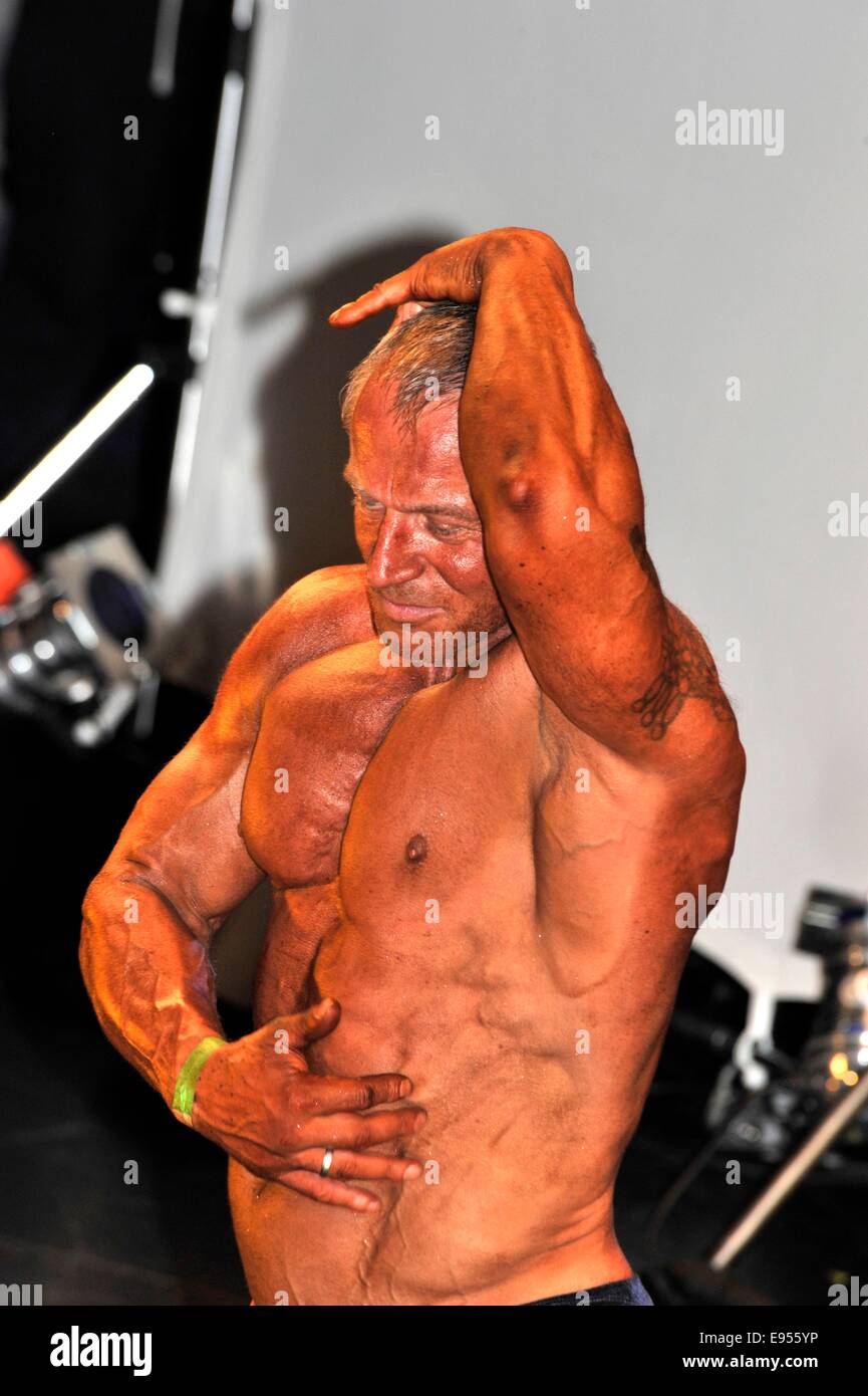 Roosendahl, The Netherlands. 19th Oct, 2014. Male bodybuilders showing ...