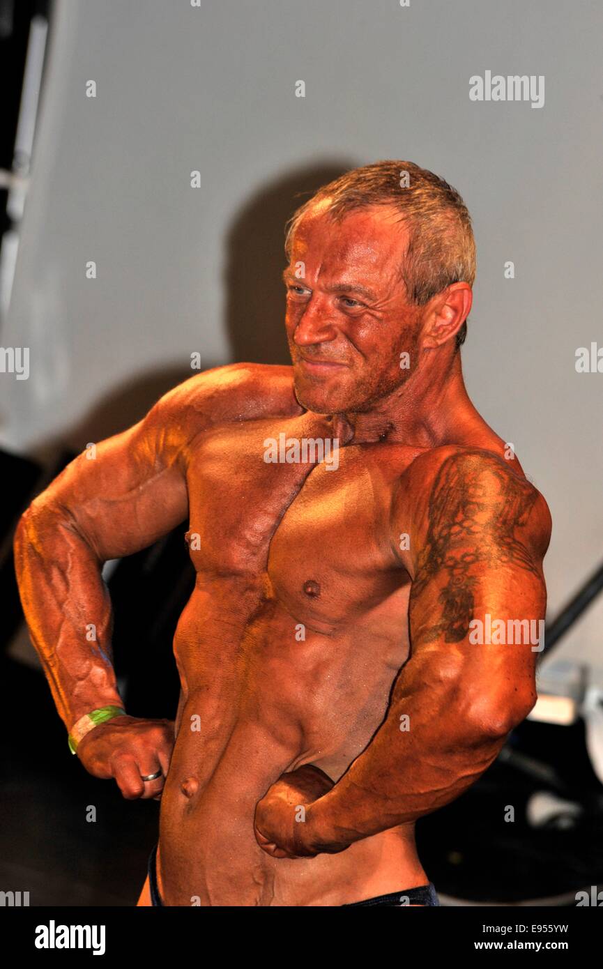 Roosendahl, The Netherlands. 19th Oct, 2014. Male bodybuilders showing ...