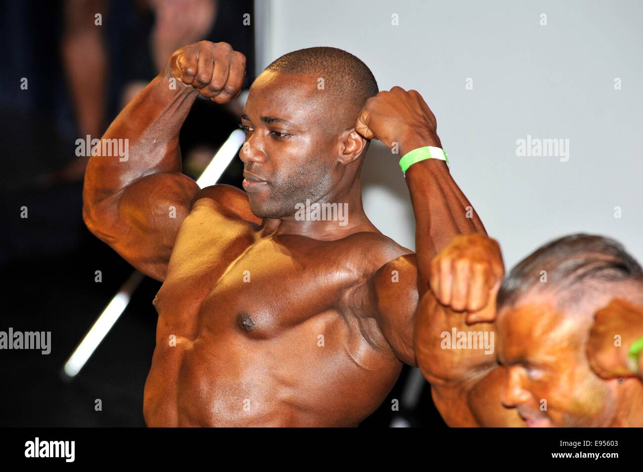 Roosendahl, The Netherlands. 19th Oct, 2014. Male bodybuilders showing ...