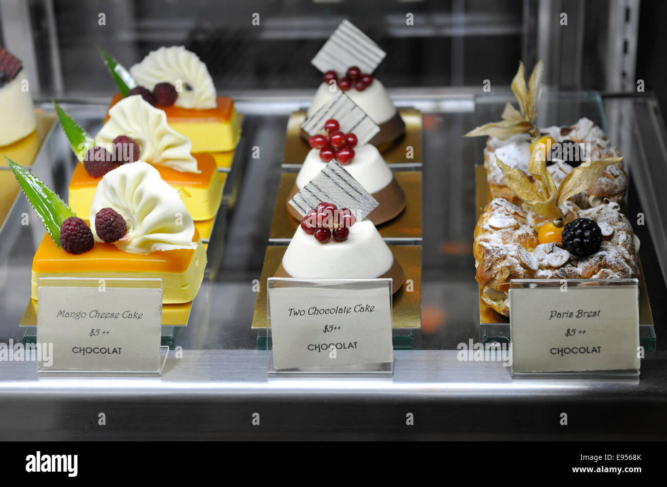 Display with cake slices and pastry, Phnom Penh, Cambodia Stock Photo ...