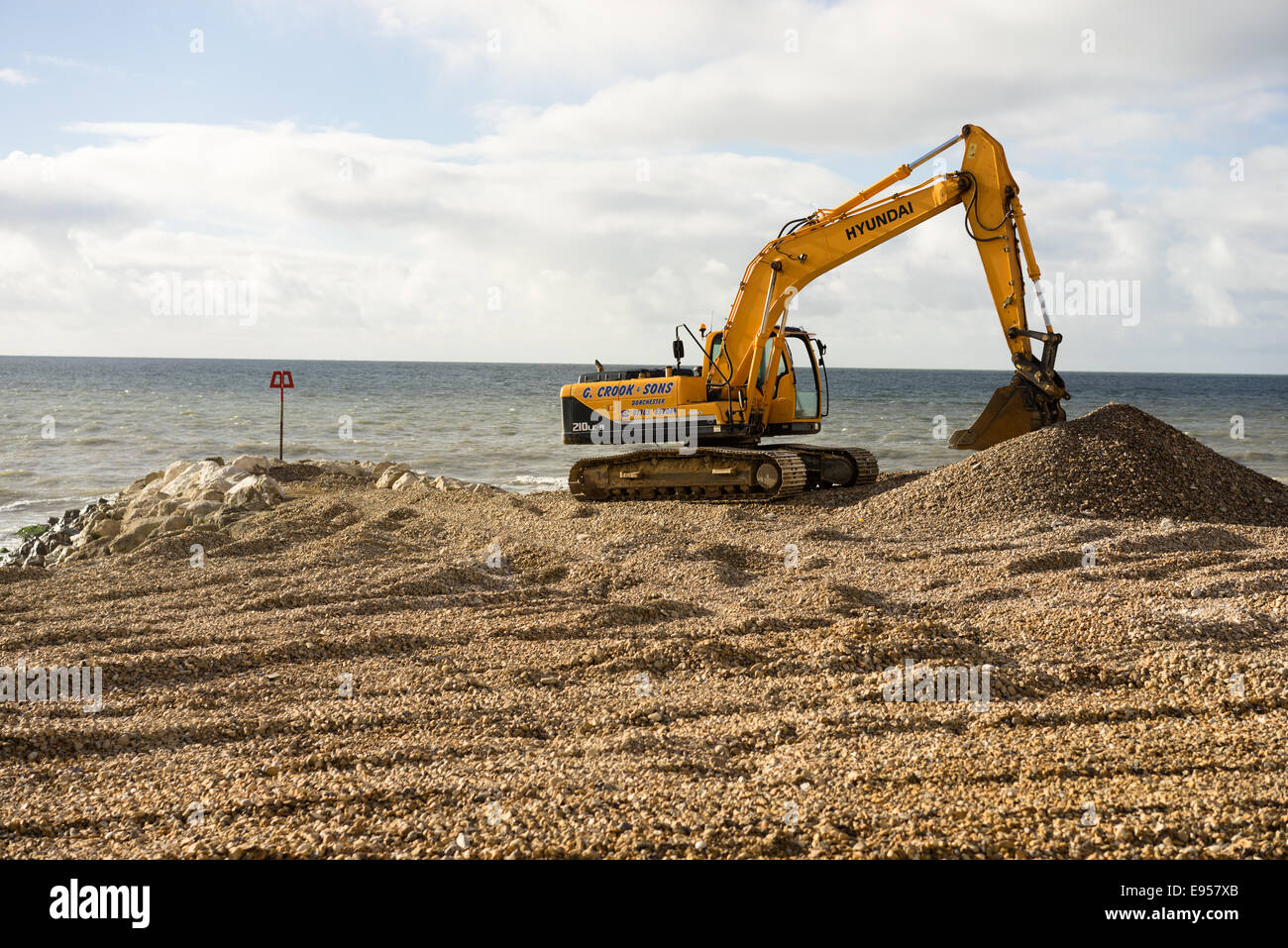 Construction vehicles on a beach hi-res stock photography and images ...