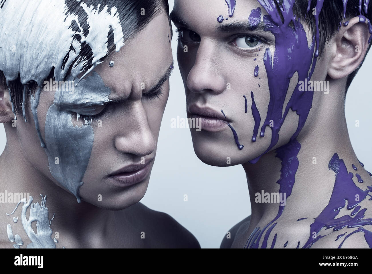 cold men in silver and violet paint Stock Photo - Alamy