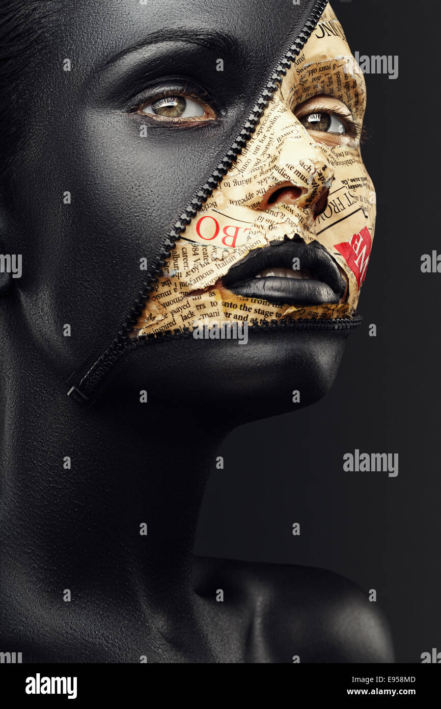 girl with black skin and make-up from the newspaper and lock zipper ...