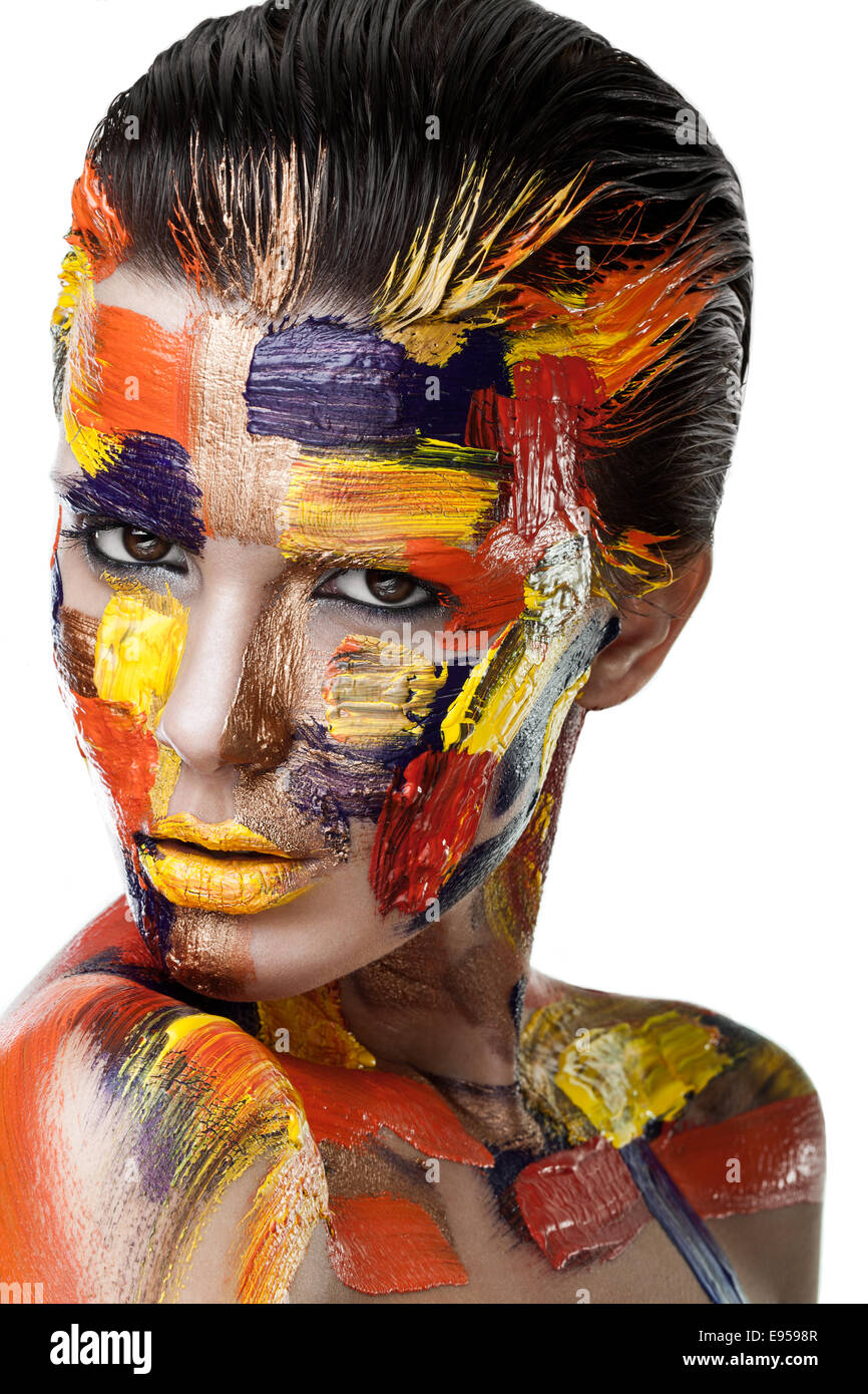 Portrait of a woman with colorful paint brushstroken on face Stock ...