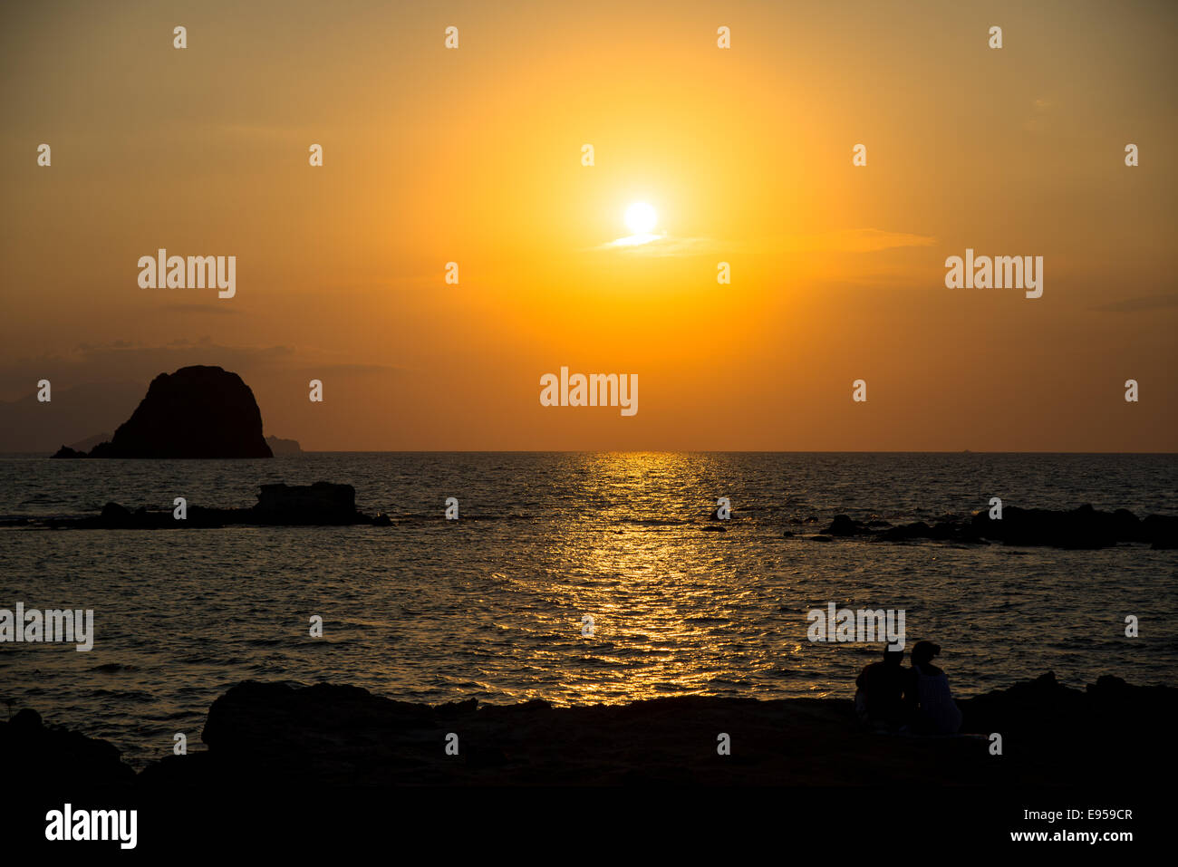 sunset at milos greece Stock Photo - Alamy