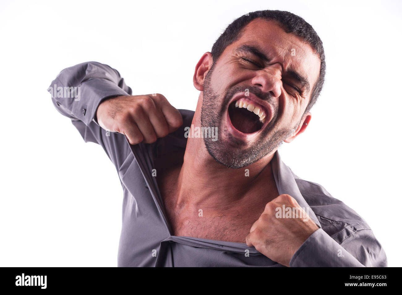man screaming and ripping his shirt Stock Photo - Alamy