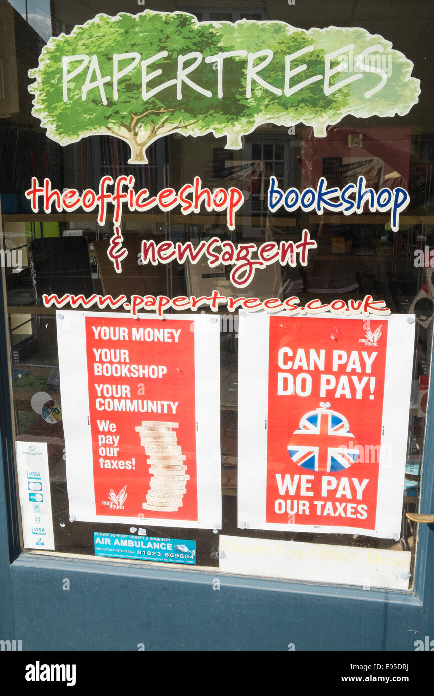 Unlike Amazon,Google,we pay our taxes sign in window of local ...