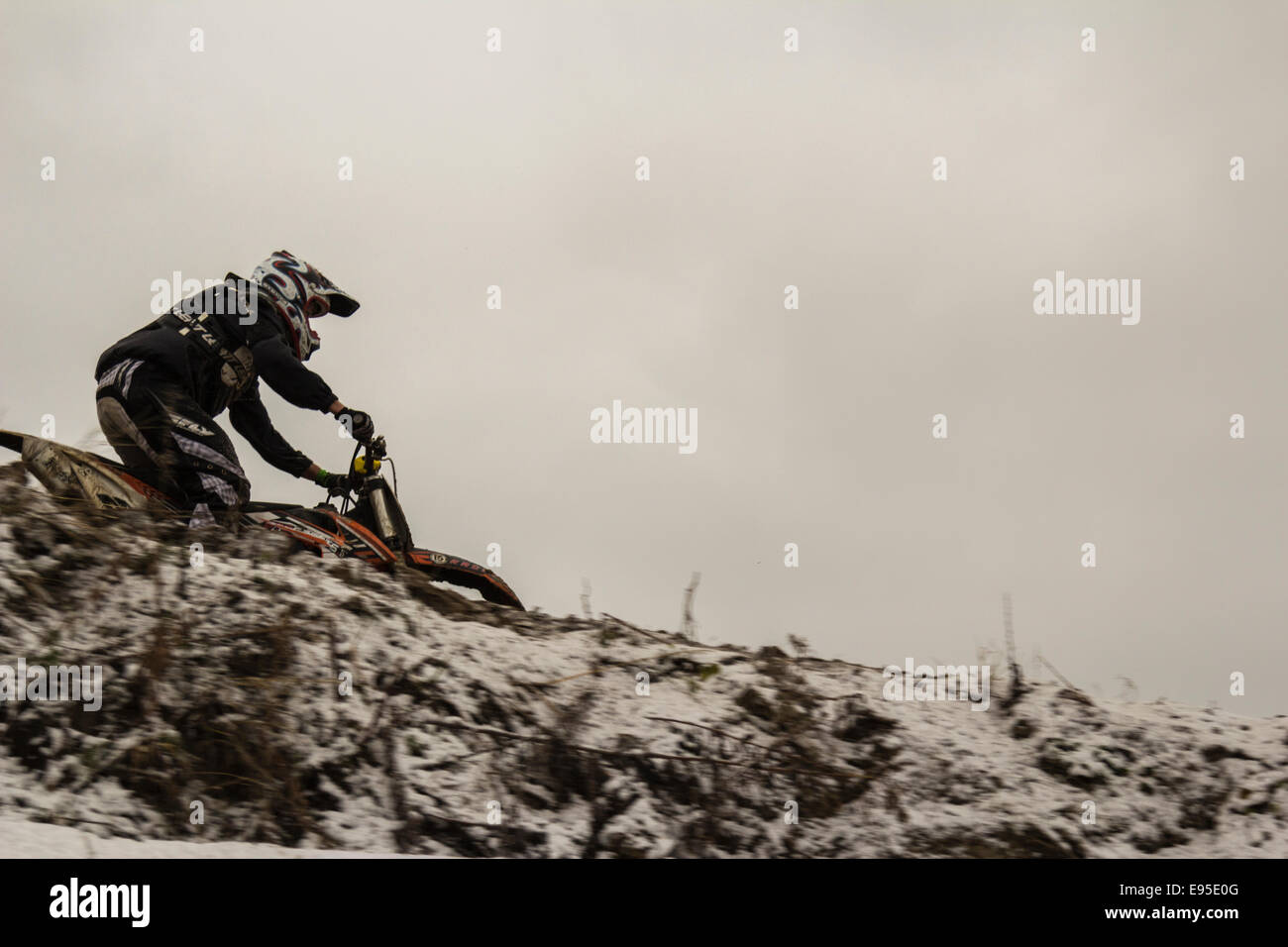 A man on a motorcycle racing at high speed Stock Photo - Alamy