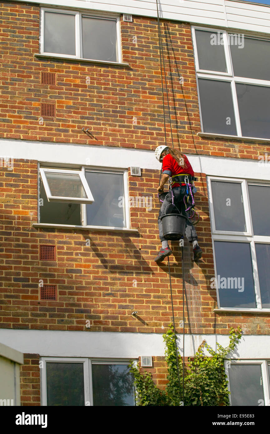 Abseiling in construction Stock Photo - Alamy