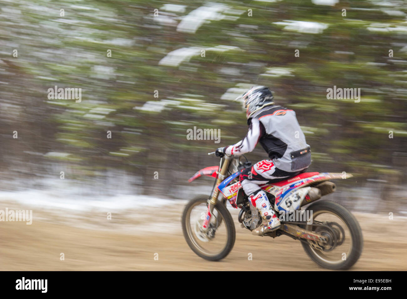 A man on a motorcycle racing at high speed Stock Photo - Alamy