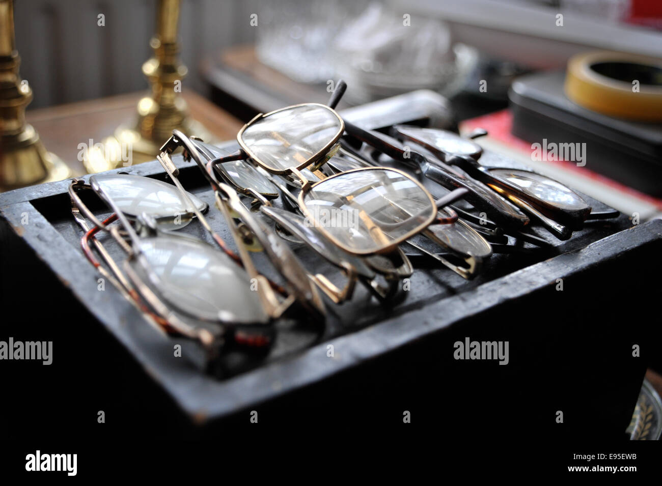a collection of spectacles in an artists studio Stock Photo - Alamy